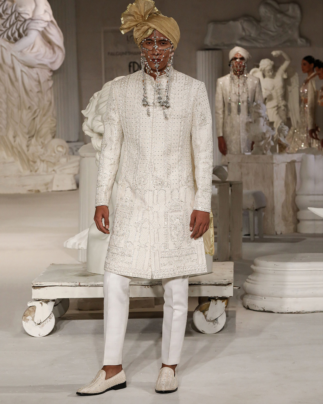FALGUNI SHANE PEACOCK ivory sherwanis for men